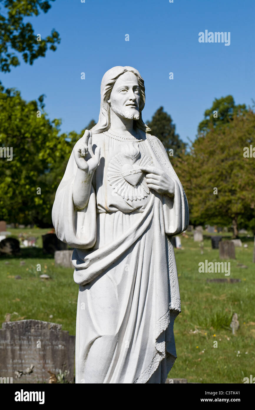 Statue of Christ with Sacred Heart. Norwich cemetery, Norfolk, England ...