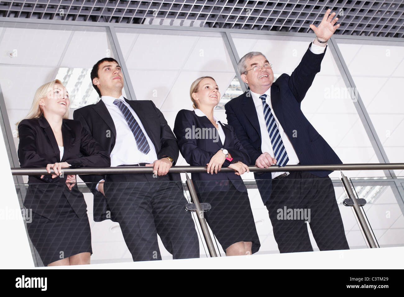 Group of businesspeople with their senior boss Stock Photo - Alamy