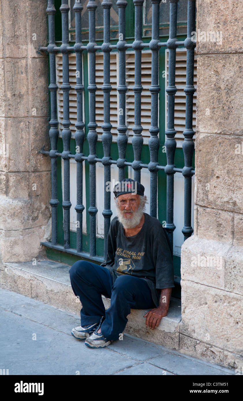 Old poor man in step in downtown havana Cuba downtown Stock Photo - Alamy