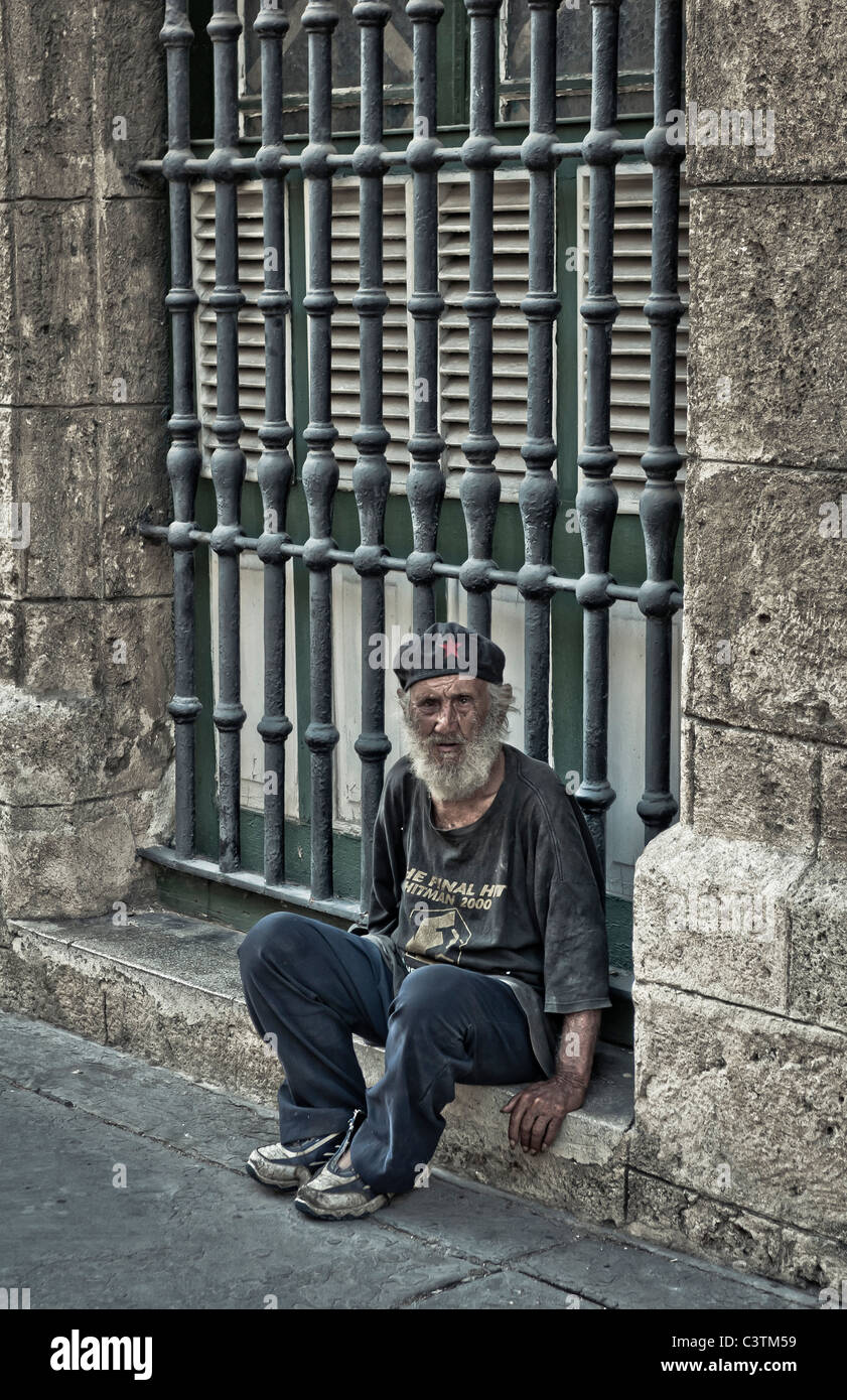 Old poor man in step in downtown havana Cuba downtown Stock Photo - Alamy