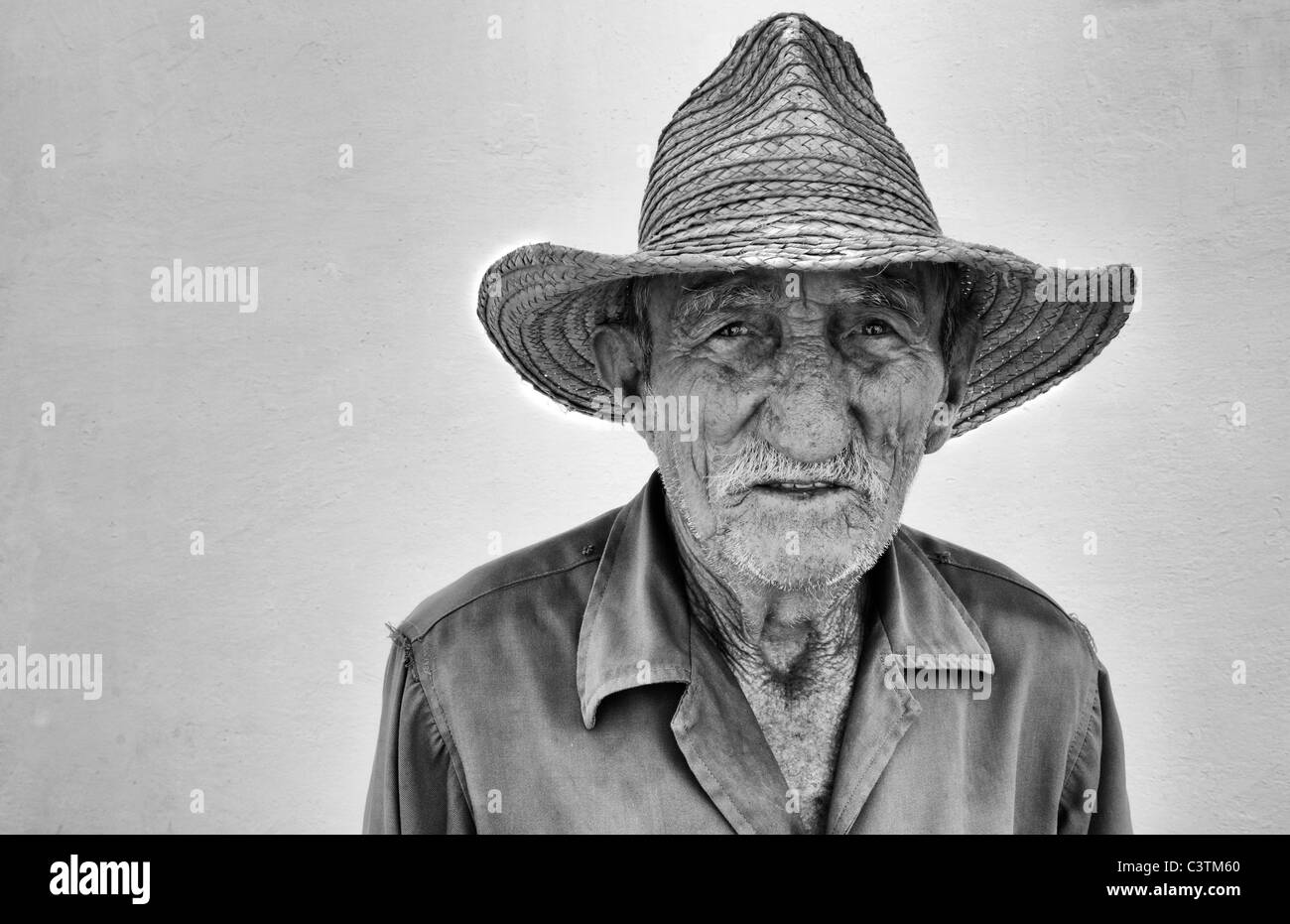 Portrait of poor man with straw hat in small town of Australia Cuba ...
