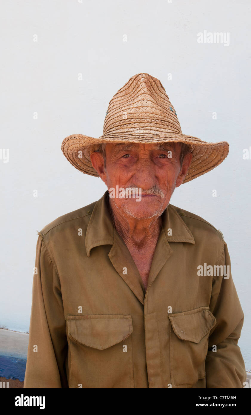 Portrait of poor man with straw hat in small town of Australia Cuba ...