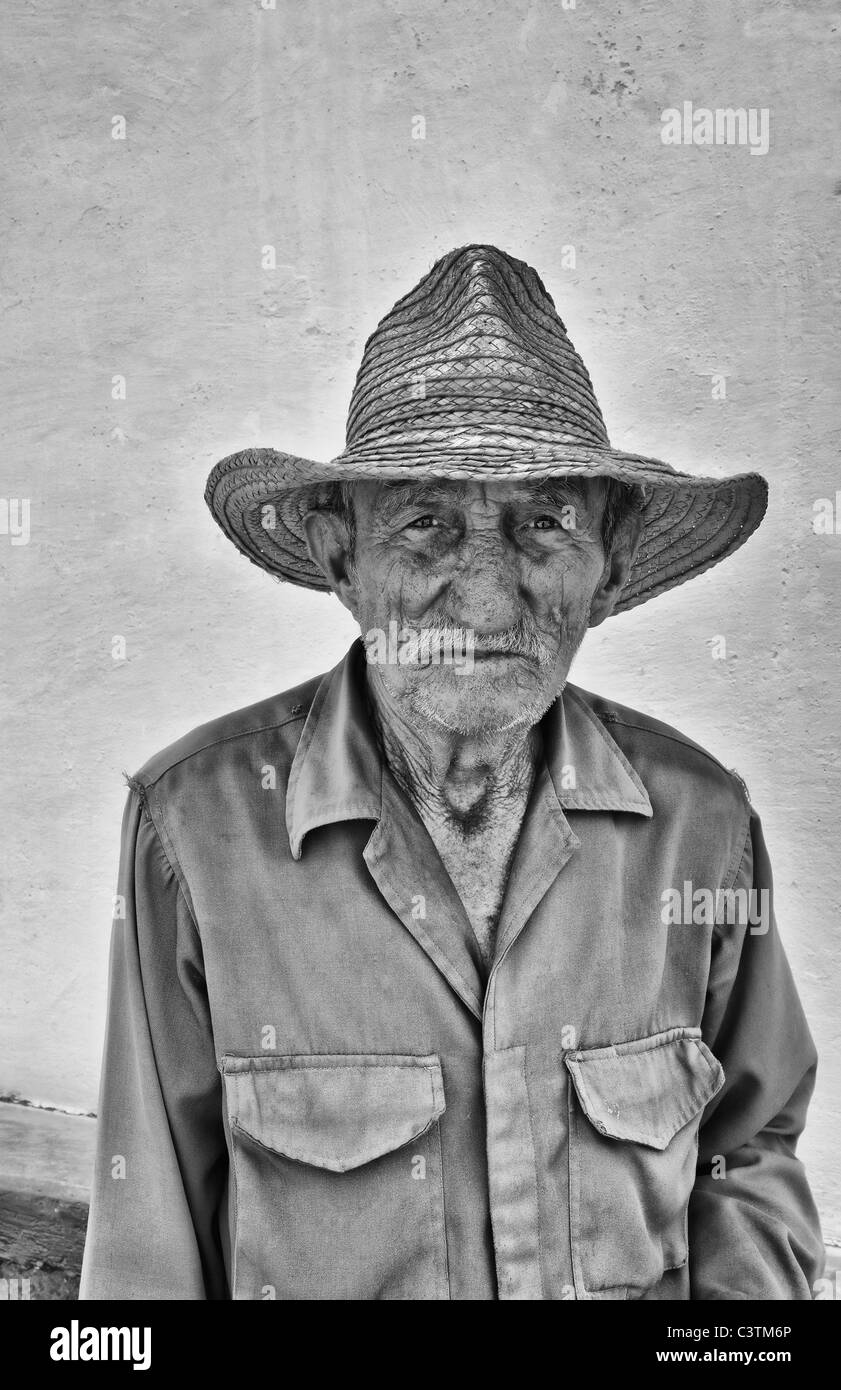 Portrait of poor man with straw hat in small town of Australia Cuba ...