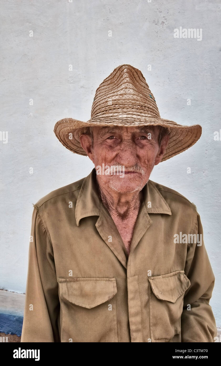 Portrait of poor man with straw hat in small town of Australia Cuba ...