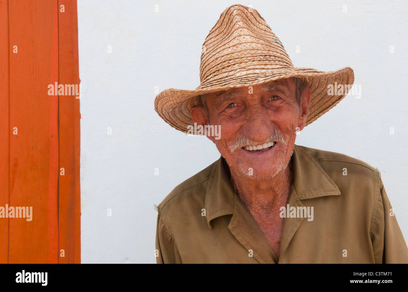 Portrait of poor man with straw hat in small town of Australia Cuba ...