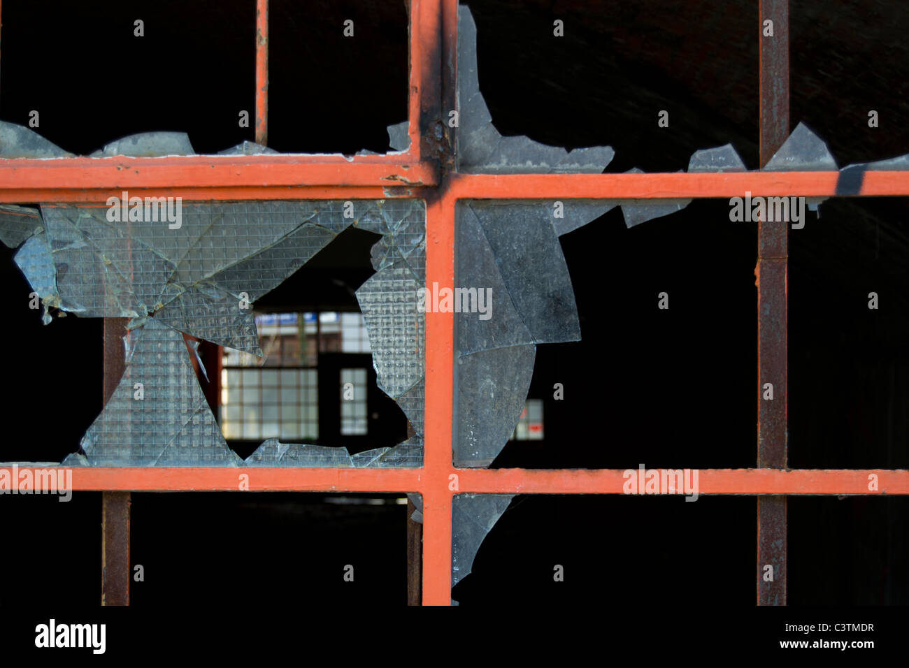 Old broken window/door with red steel frame Stock Photo - Alamy