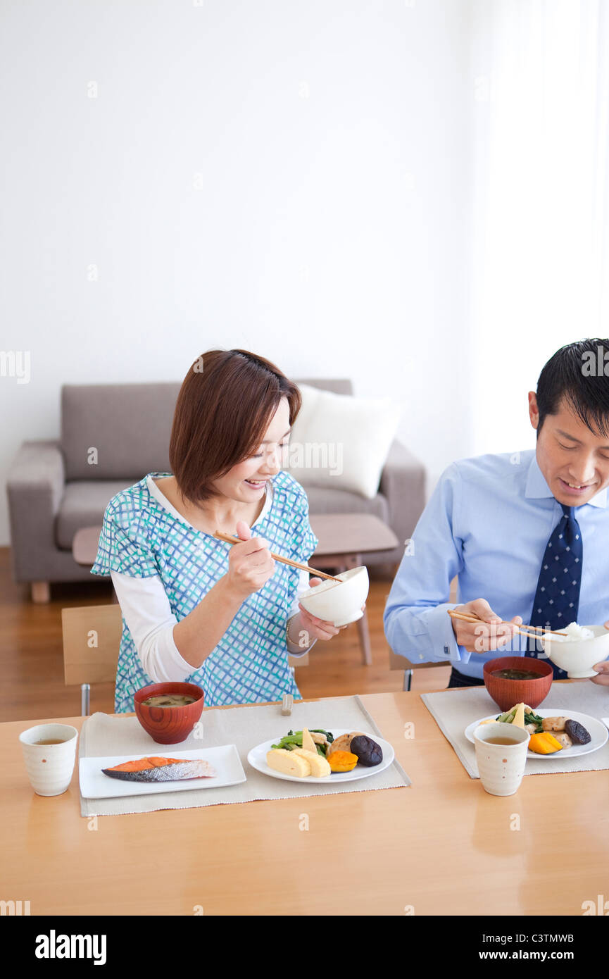 Mid Adult Couple Having Breakfast Stock Photo - Alamy