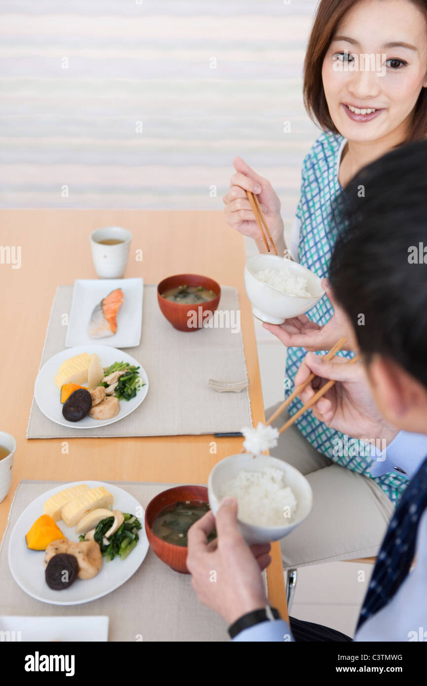 Mid Adult Couple Having Breakfast Stock Photo - Alamy