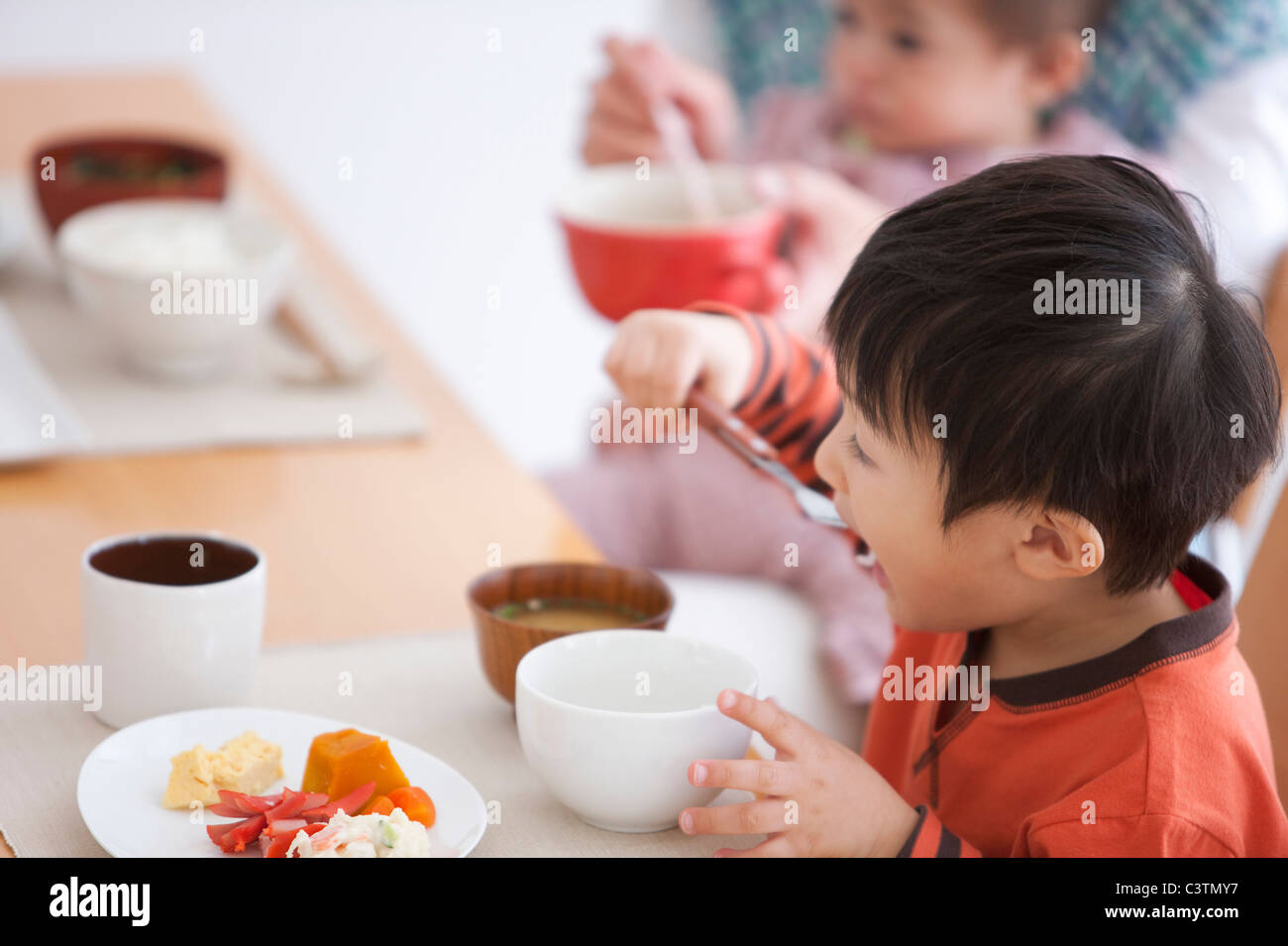 Boy Having Breakfast Stock Photo - Alamy