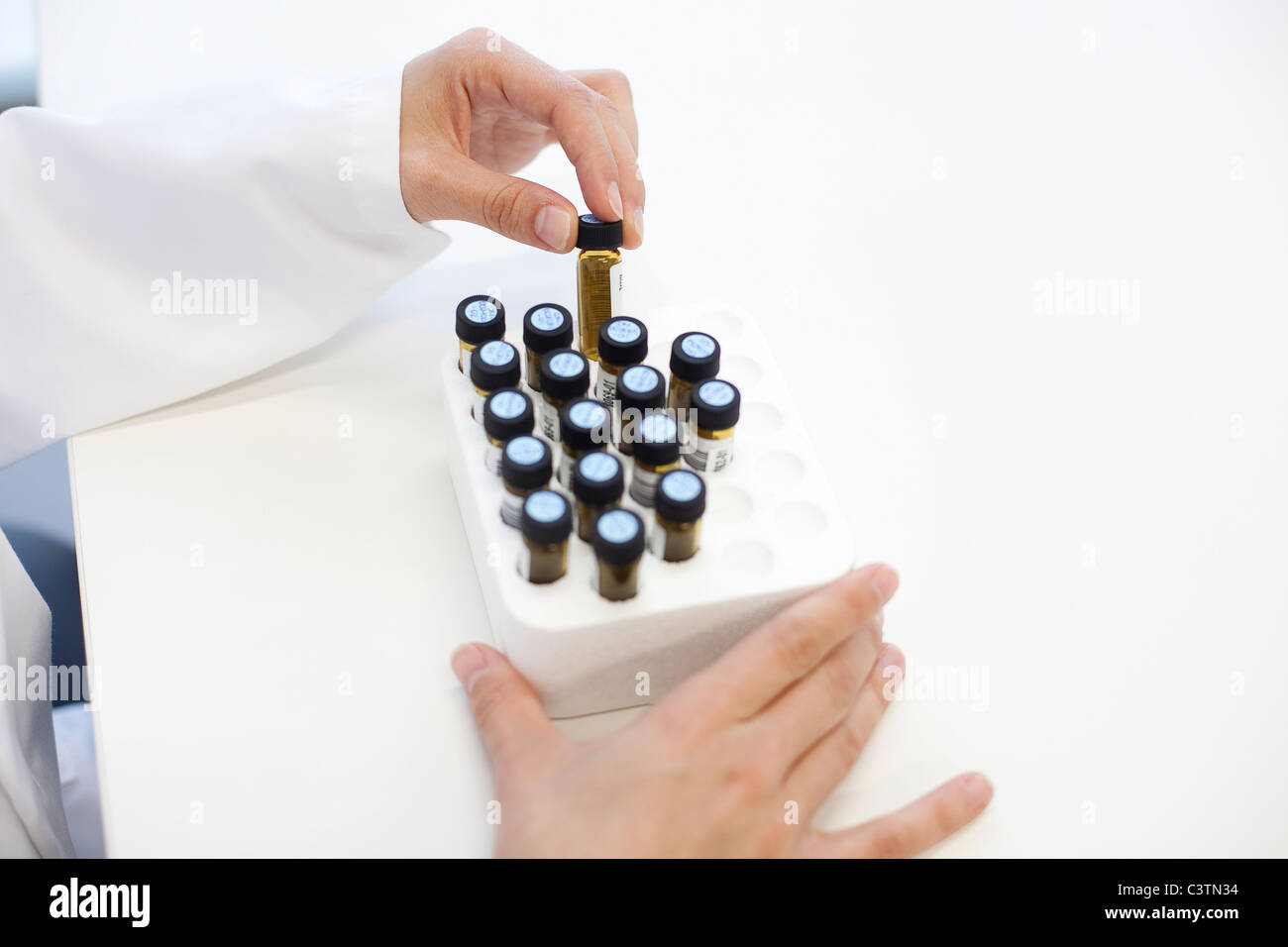 Scientific manipulating crystal test tubes in a laboratory Stock Photo ...