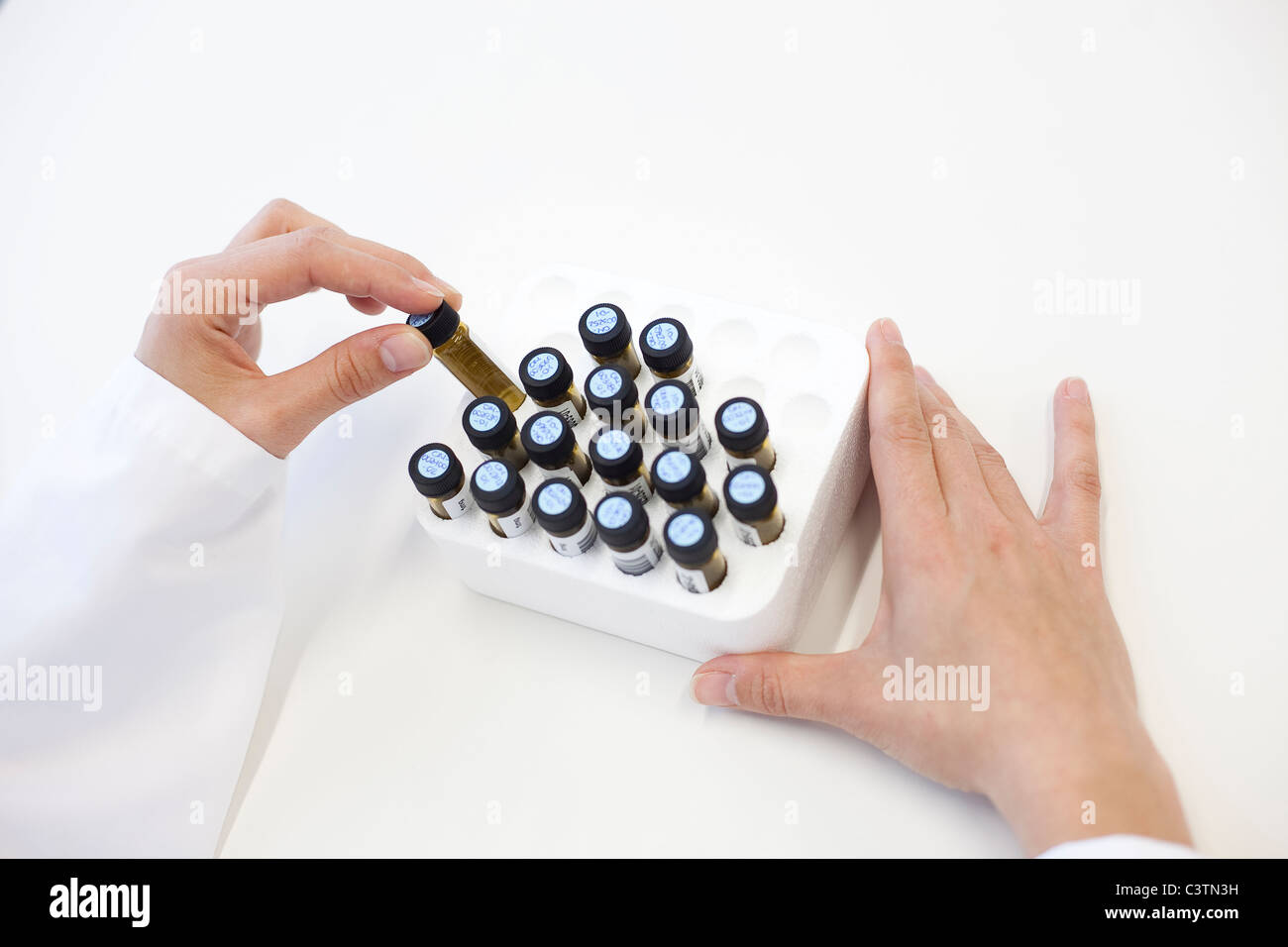 Scientific manipulating crystal test tubes in a laboratory Stock Photo ...
