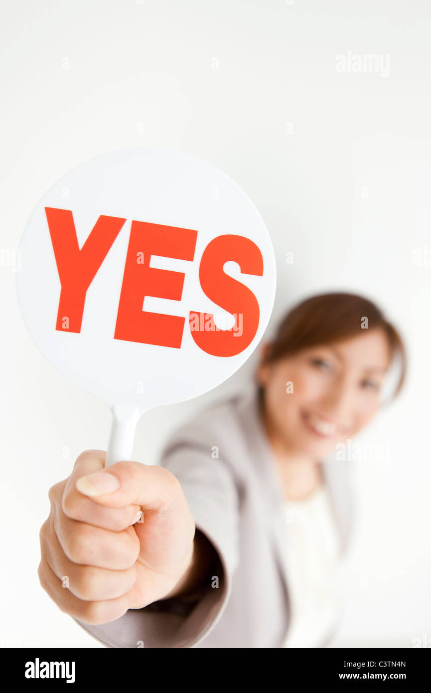 Businesswoman with Yes Sign Stock Photo - Alamy