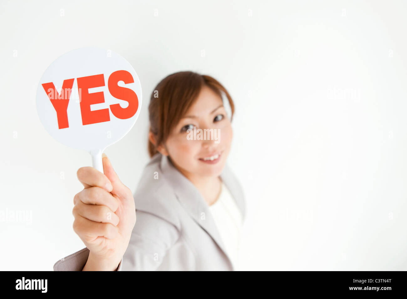 Businesswoman with Yes Sign Stock Photo - Alamy