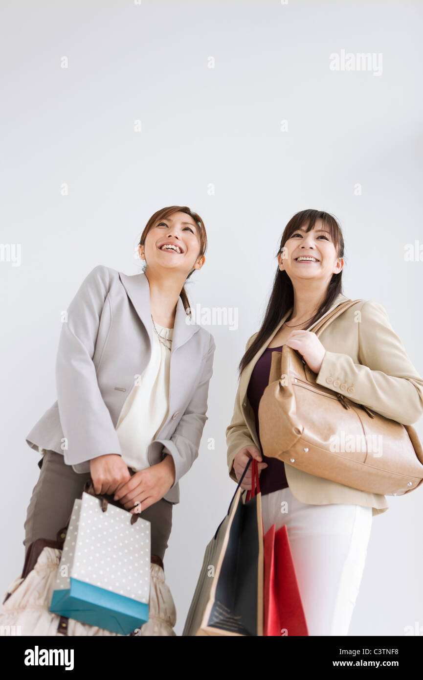 Two Women With Shopping Stock Photo - Alamy