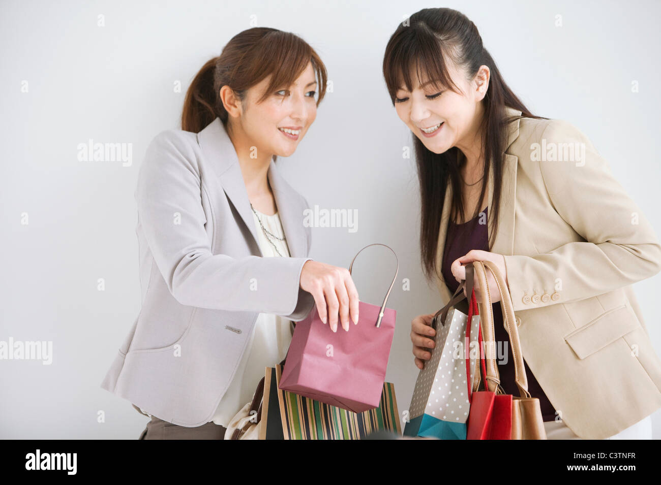 Two Women With Shopping Stock Photo - Alamy