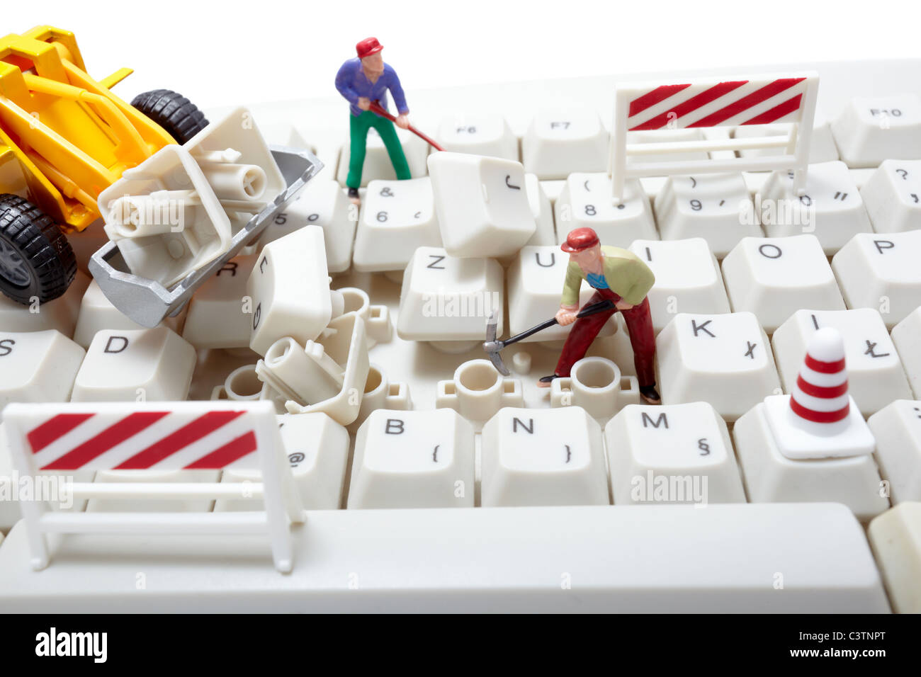 close up of computer parts and toy workers Stock Photo - Alamy