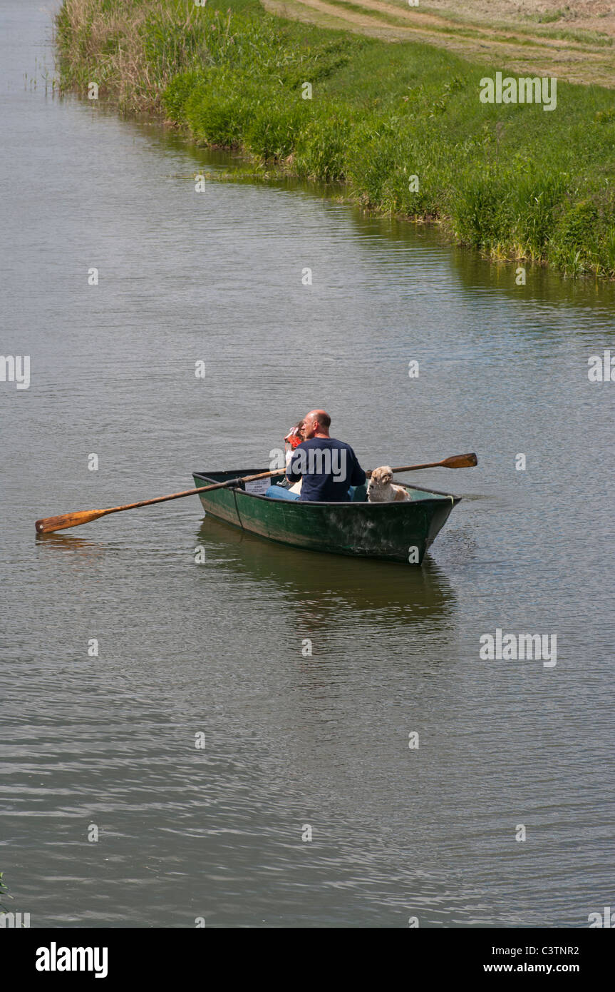 Father and Daughter With A Dog In A Rowing Boat Stock Photo - Alamy