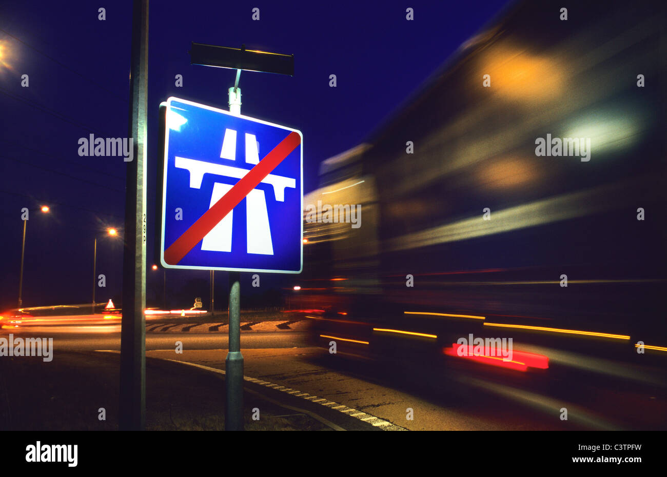 end of motorway warning sign on A1/M motorway at night leeds yorkshire ...