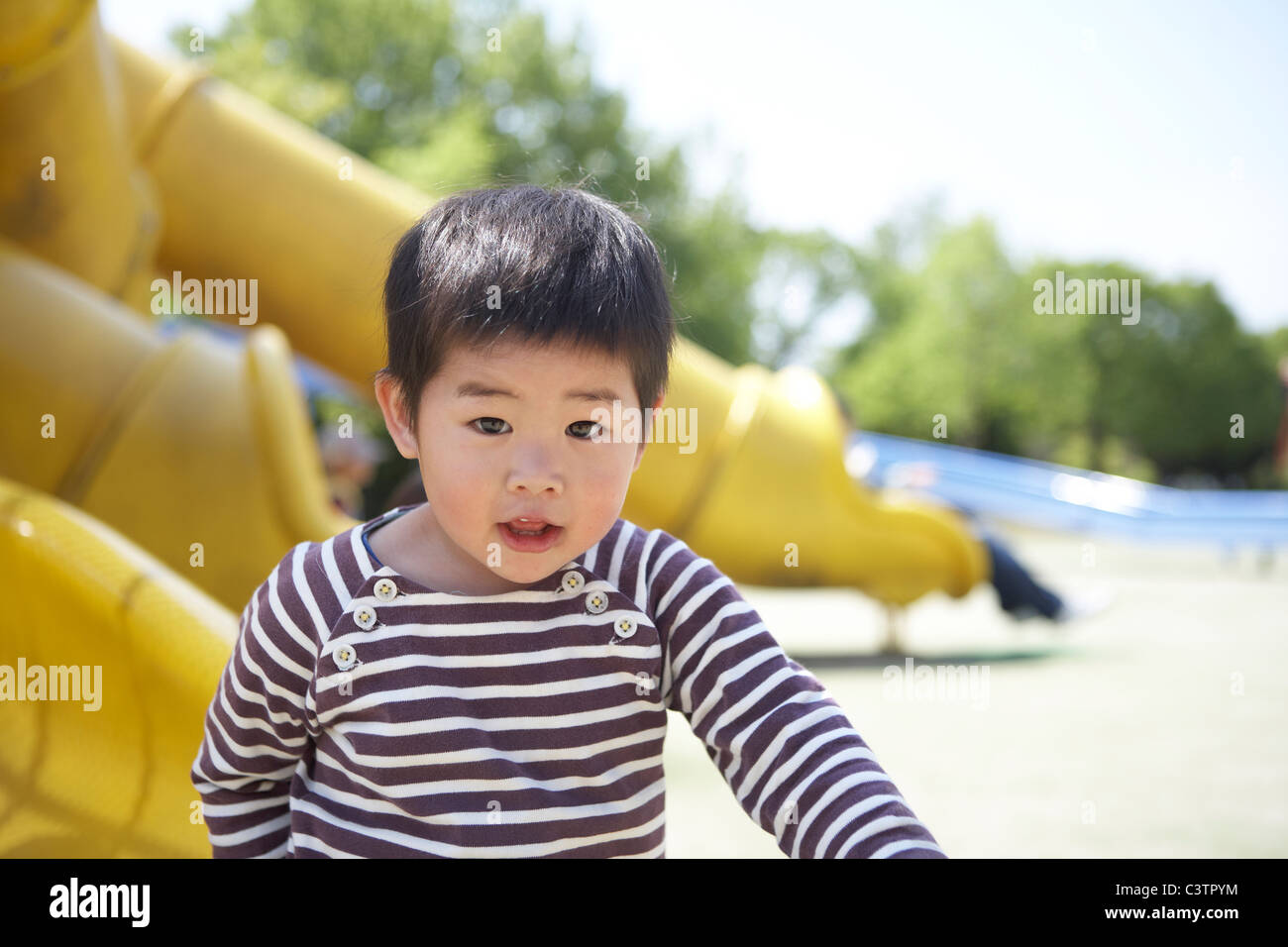 Boy in Playground Stock Photo - Alamy