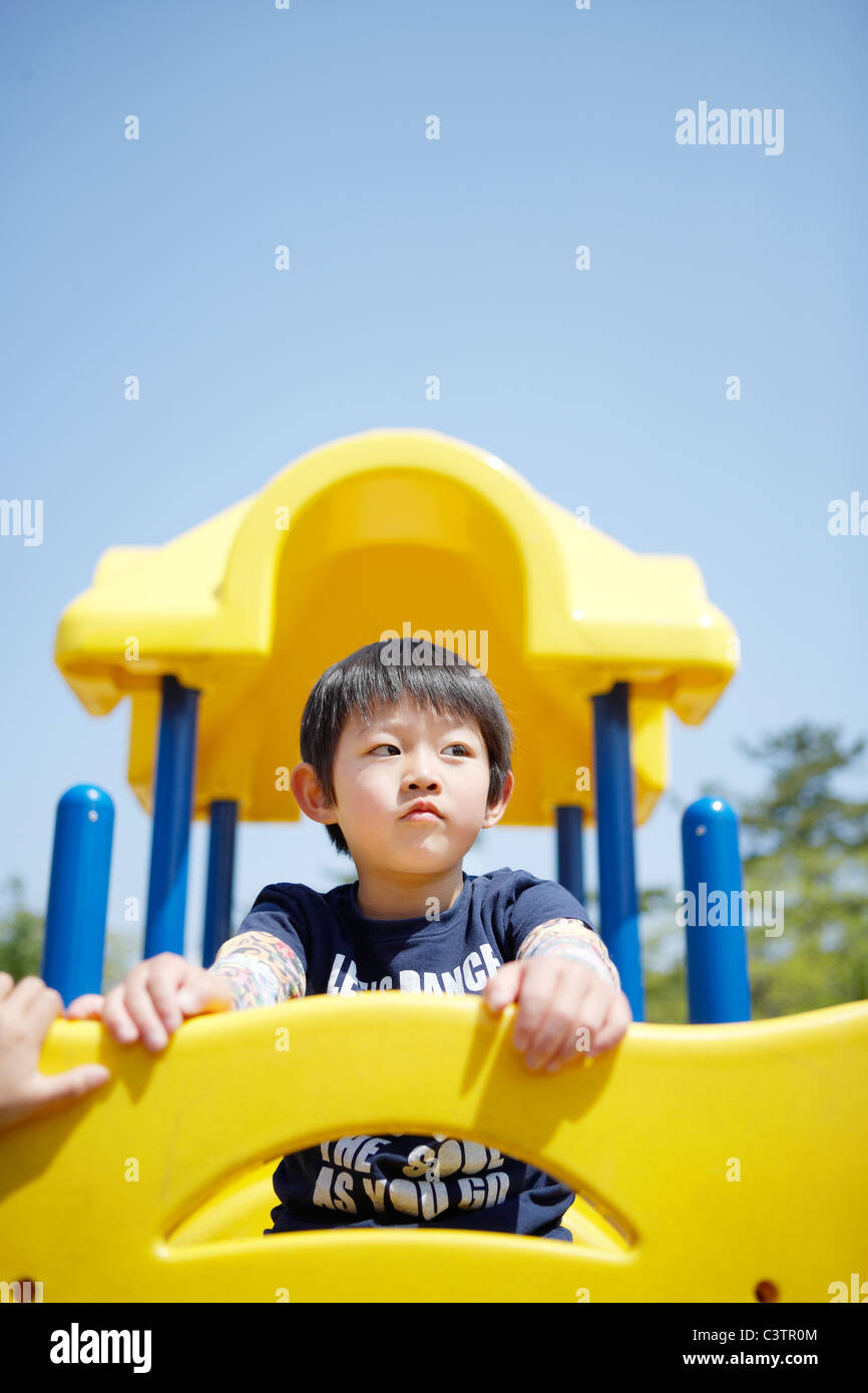 Boy in Playground Stock Photo - Alamy