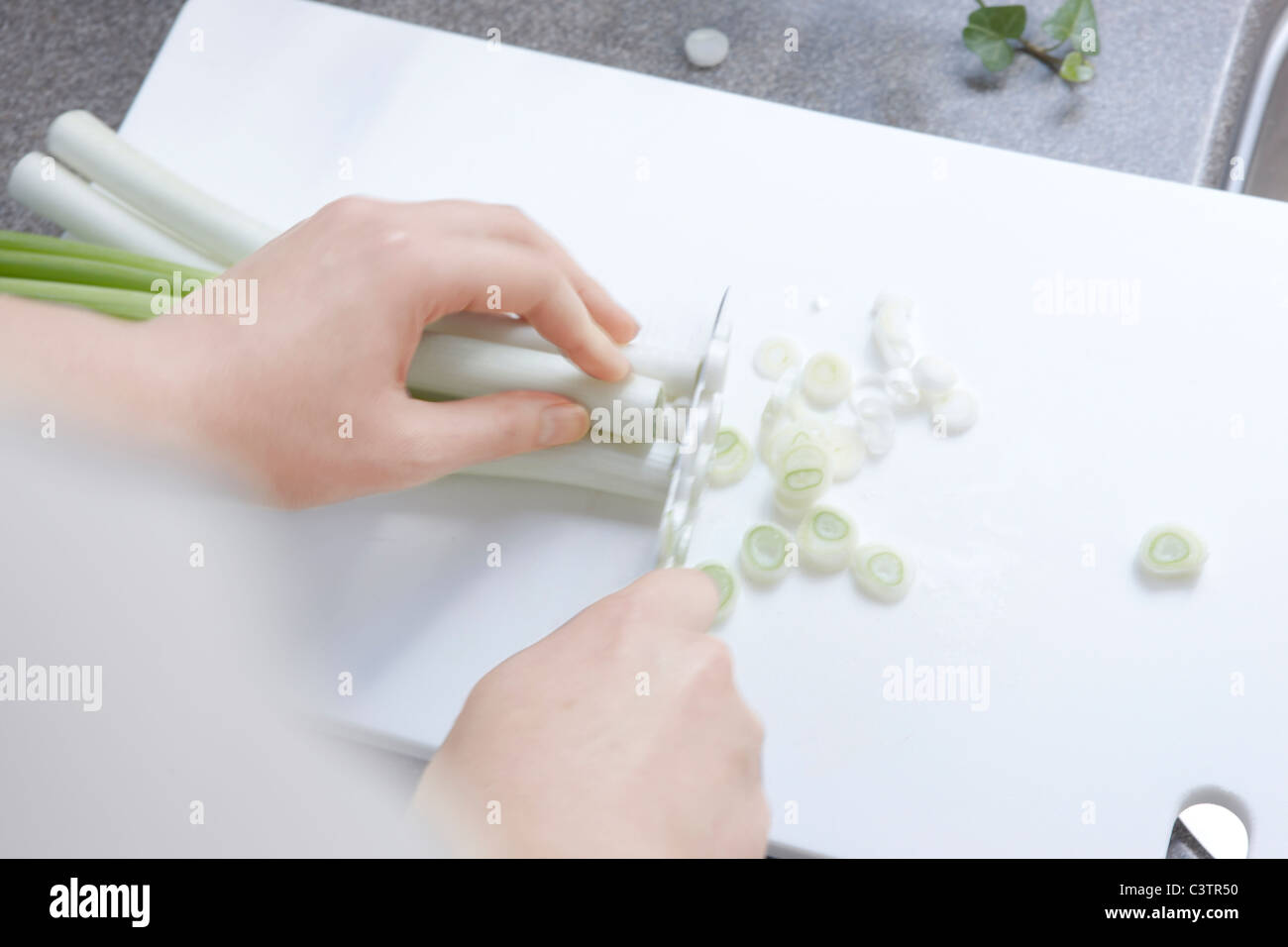 Person Chopping Leeks Stock Photo - Alamy