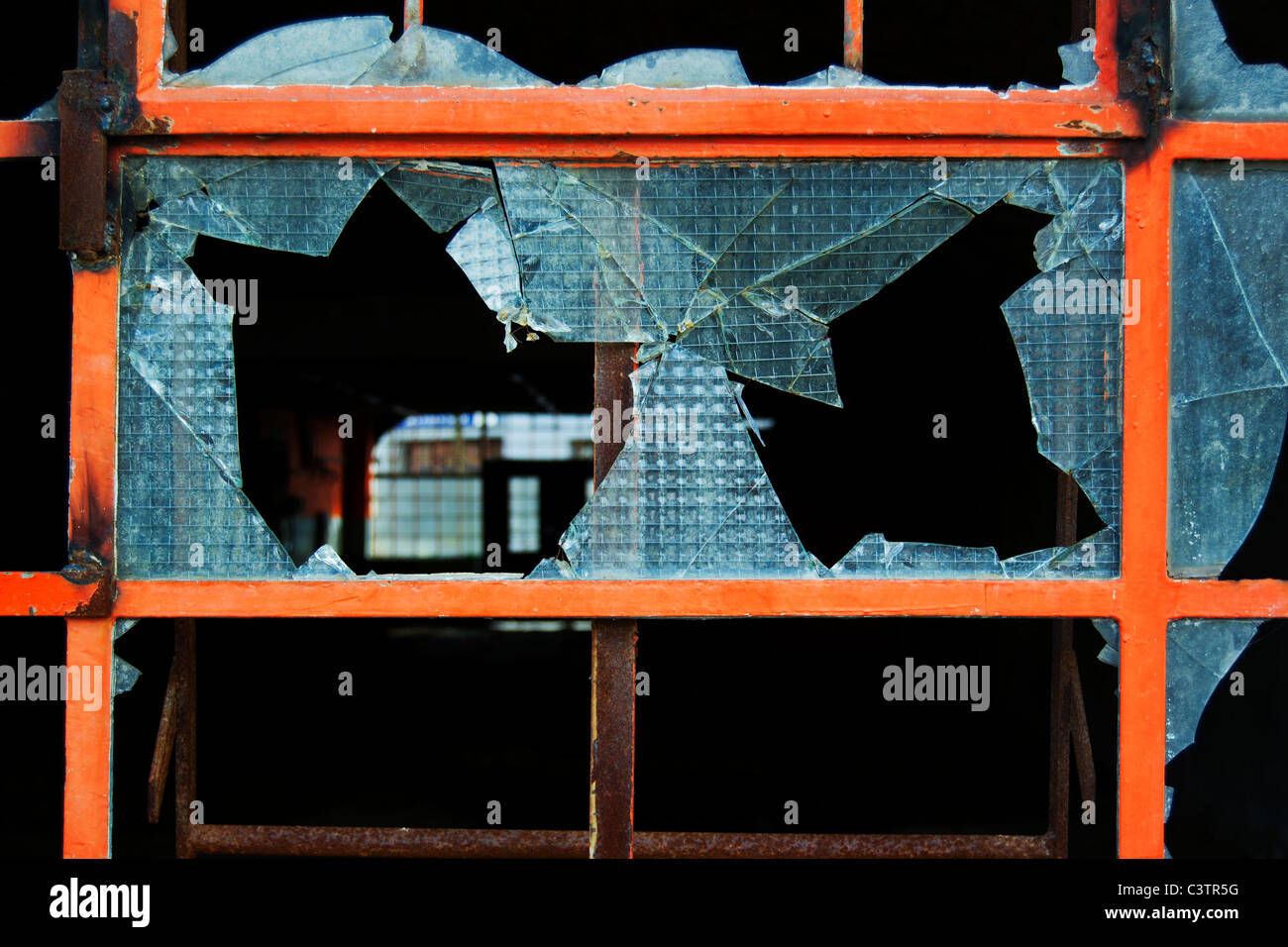 Old broken steel red painted frame window Stock Photo - Alamy