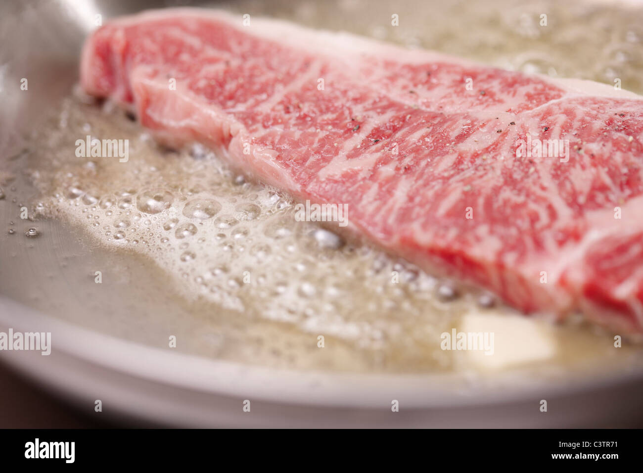 Beef Being Fried Stock Photo - Alamy