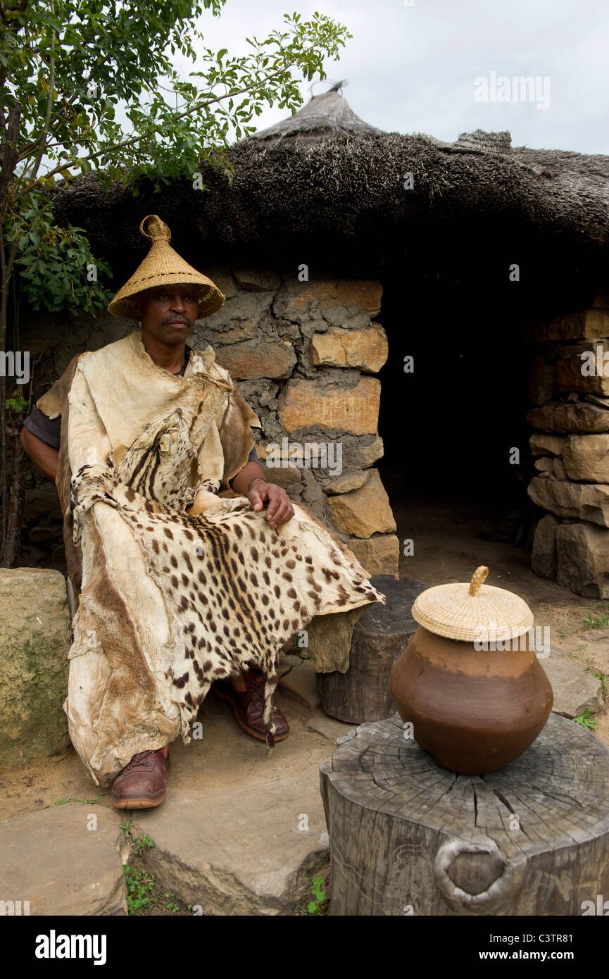 Man and traditional hut hi-res stock photography and images - Alamy