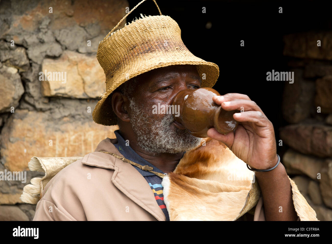 Sotho man drinking sorghum beer, Basotho Cultural Village, Golden Gate ...