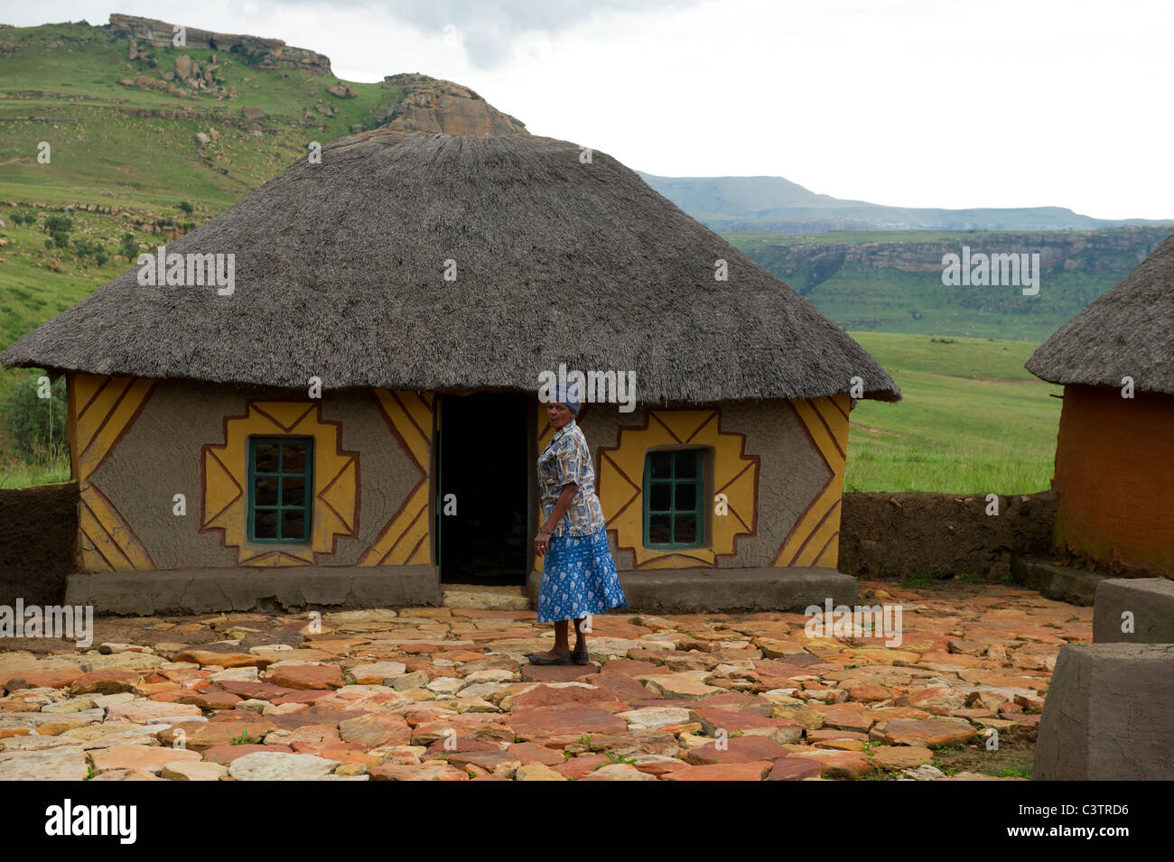 Sotho woman in front of hut, Basotho Cultural Village, Golden Gate ...