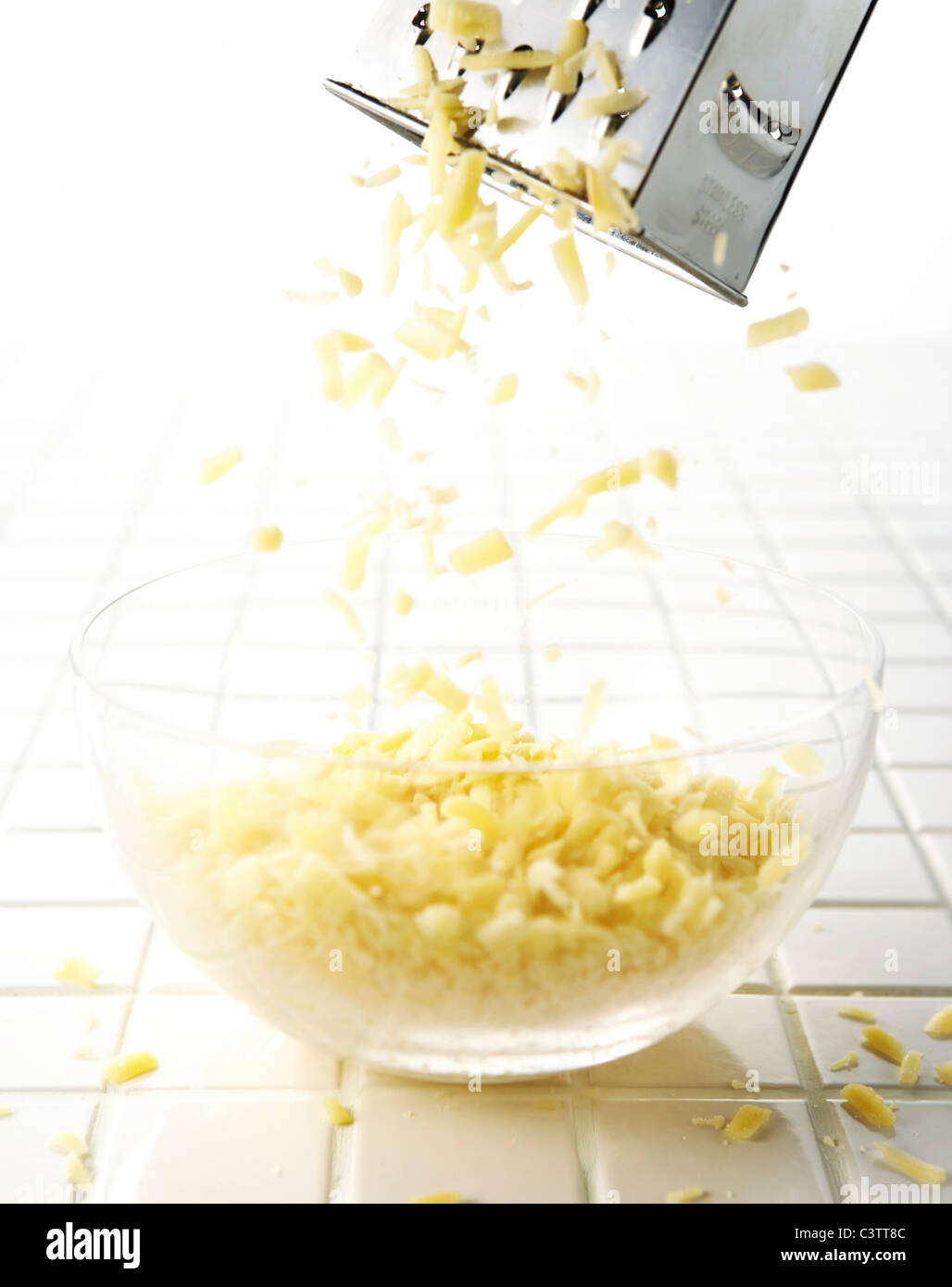 Preparing grated cheese hi-res stock photography and images - Alamy