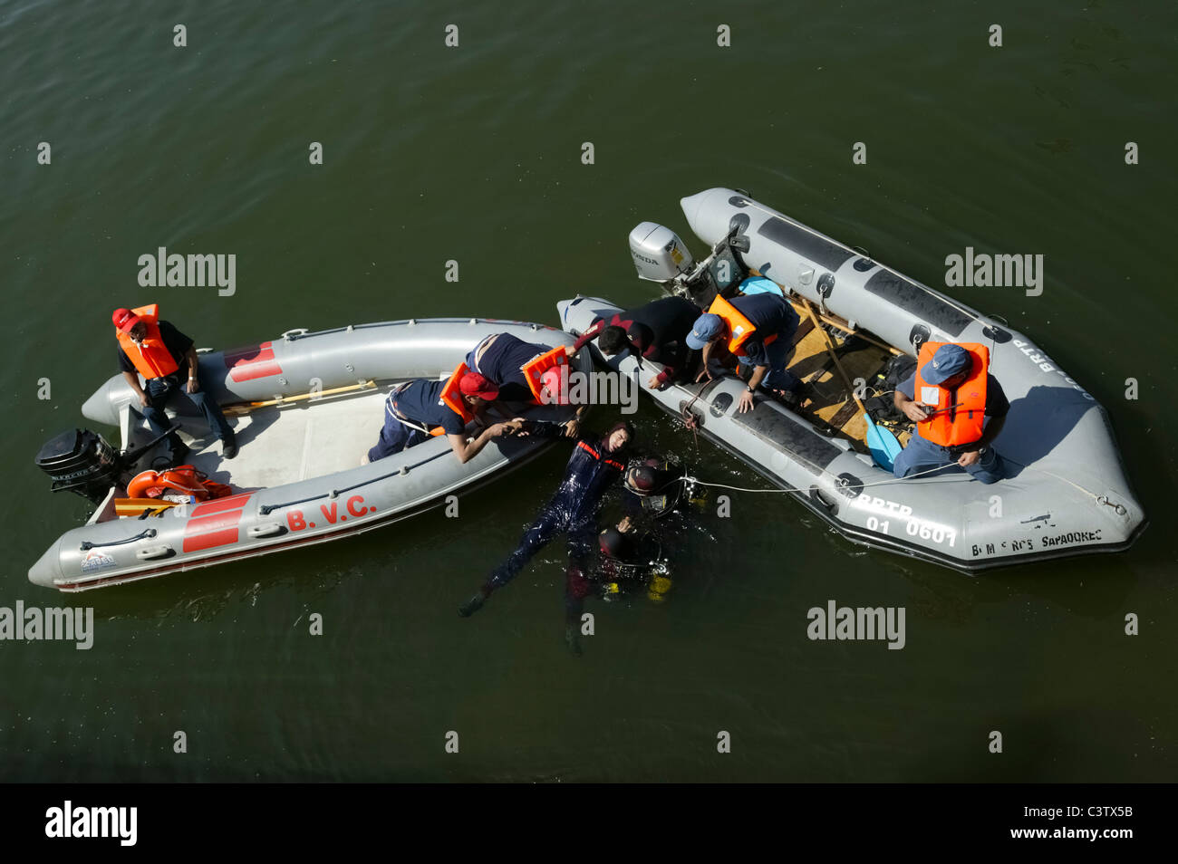 Aerial view of inflatable boats during rescue mission Stock Photo - Alamy