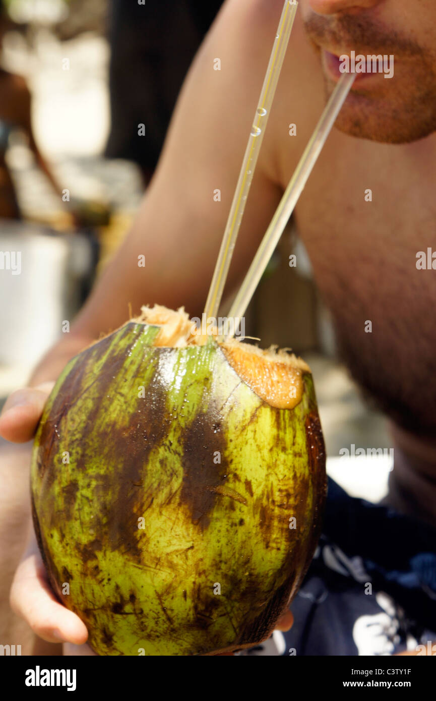 Fresh coconut drink, Bahía Concha, Colombia Stock Photo - Alamy