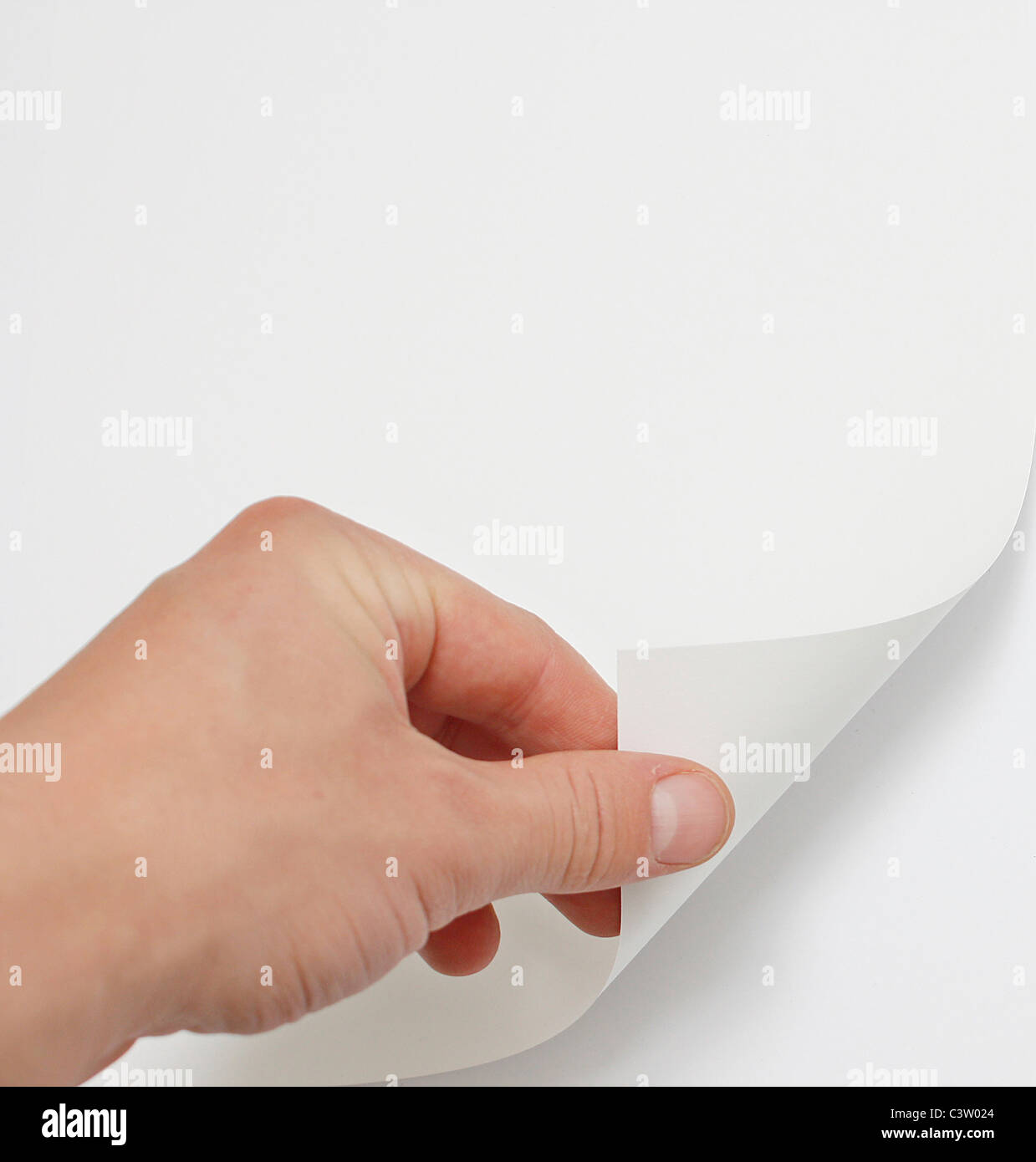 Hand turning page book hi-res stock photography and images - Alamy