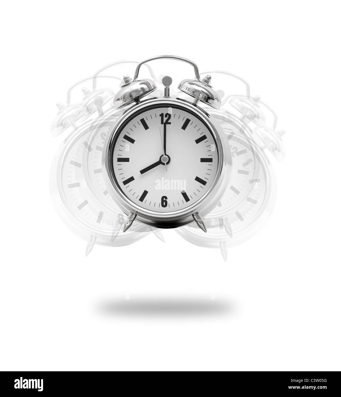 A hand breaking an alarm clock Stock Photo - Alamy