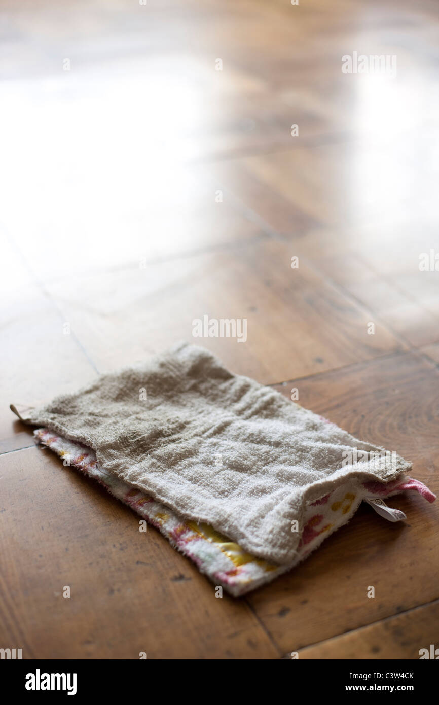 Rag on Wooden Floor Stock Photo - Alamy