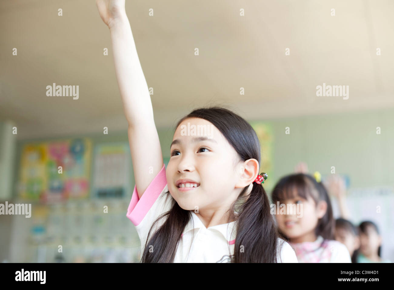 Hand raised and classroom hi-res stock photography and images - Alamy