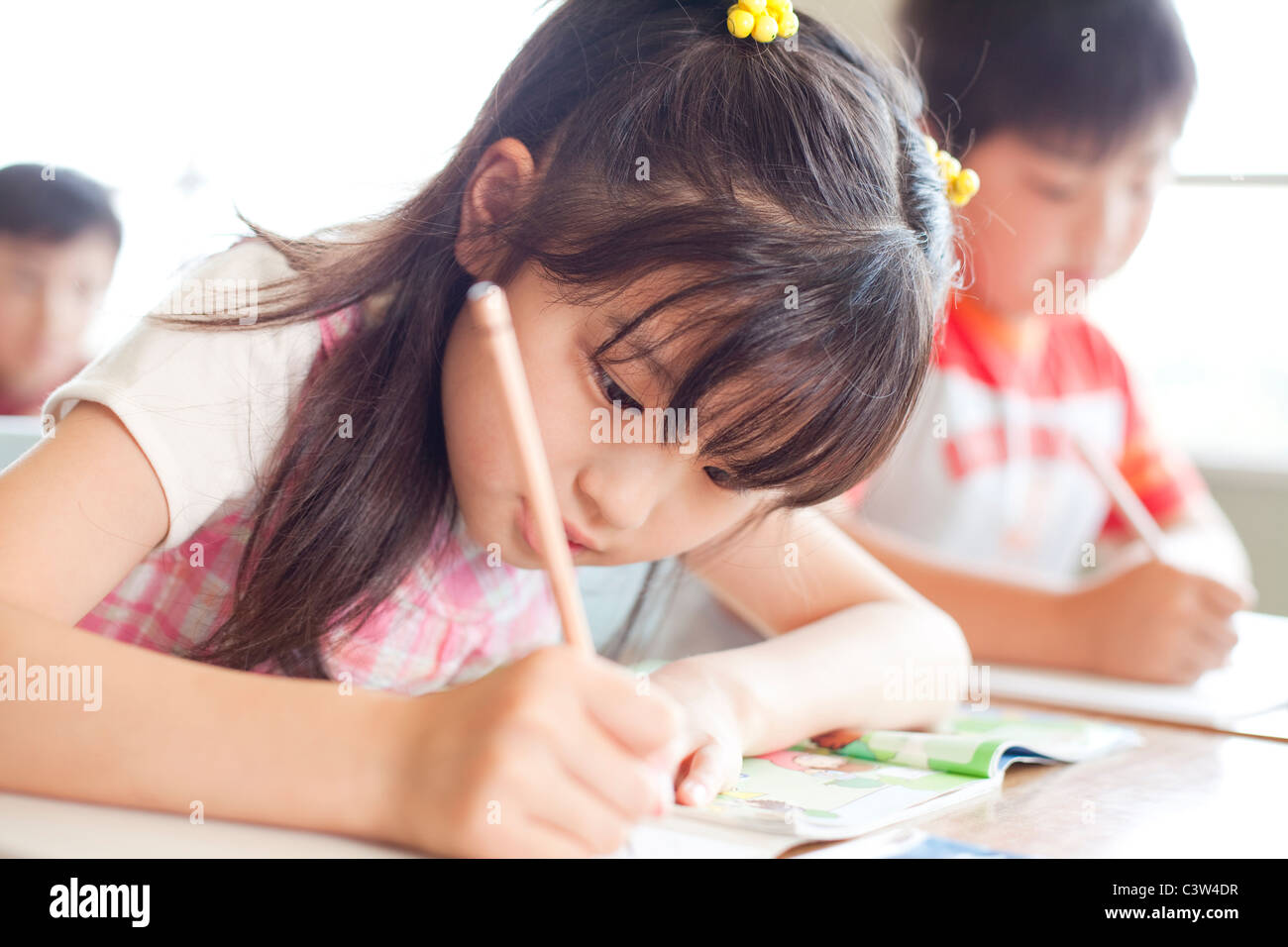 Girl desk school writing hi-res stock photography and images - Alamy