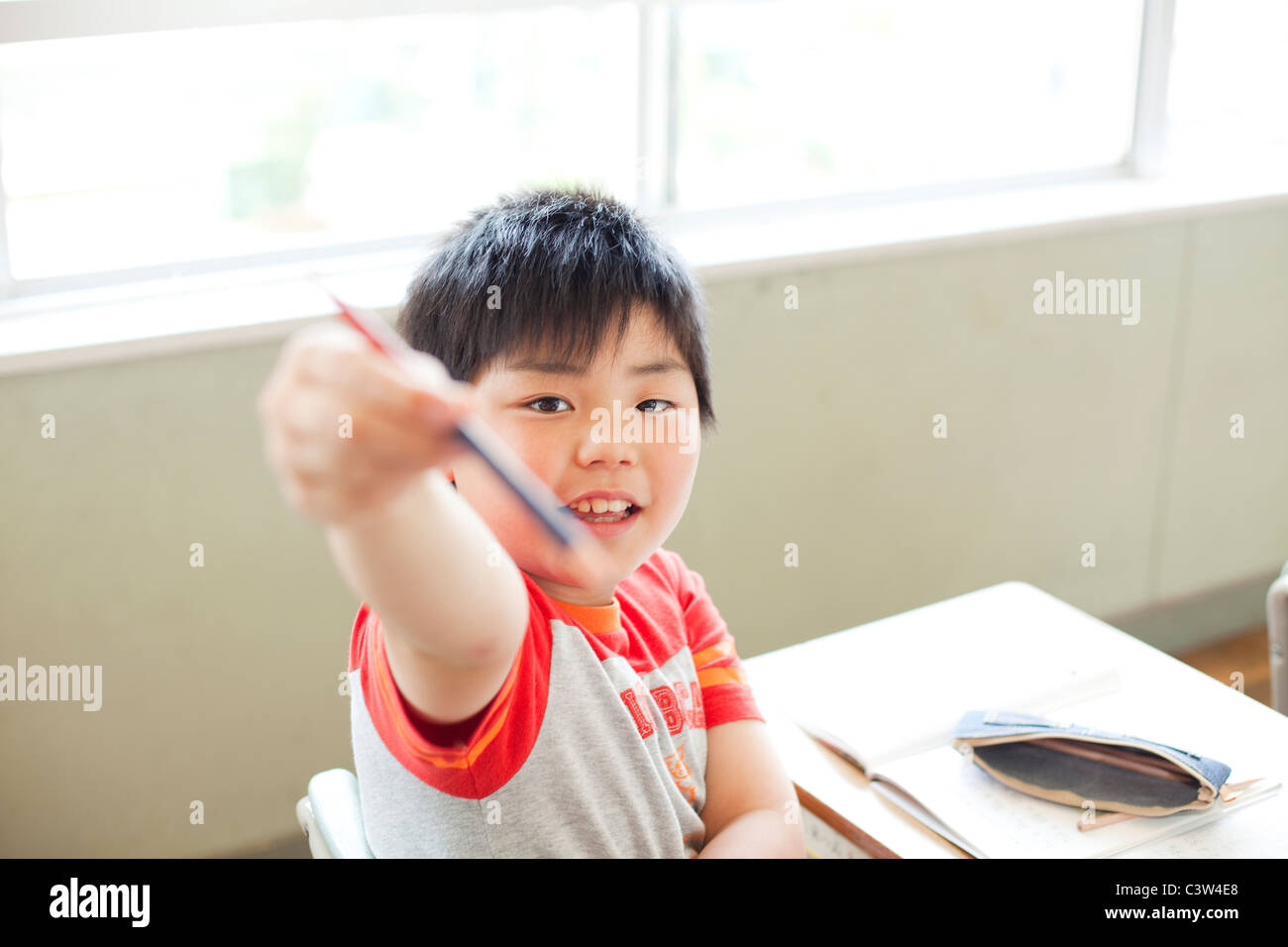 Using pencil in classroom hi-res stock photography and images - Alamy