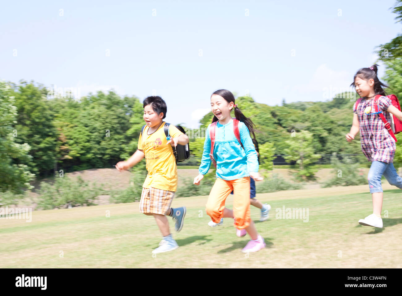 Group running forward hi-res stock photography and images - Alamy