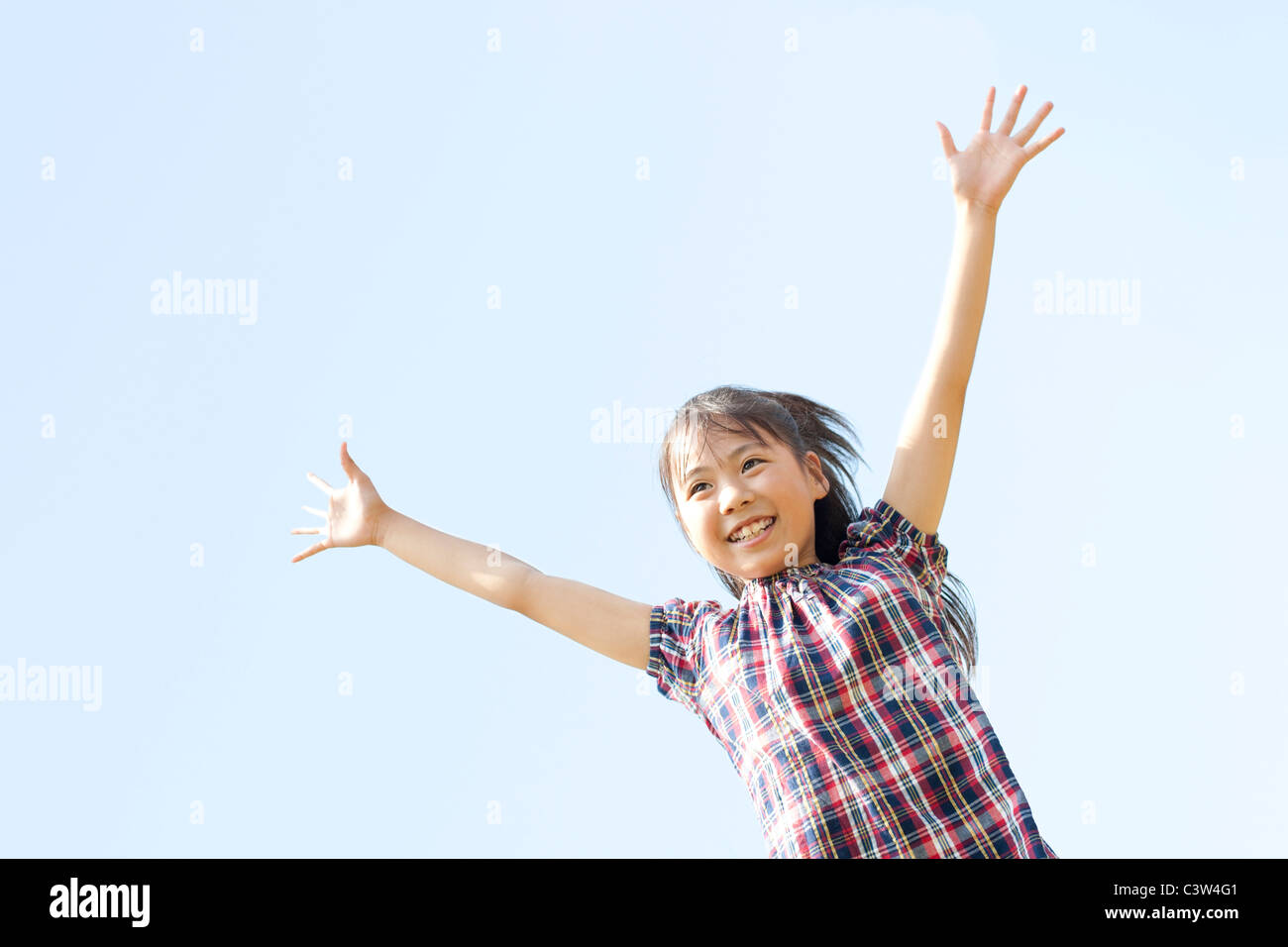Girl Spreading Arms Stock Photo - Alamy
