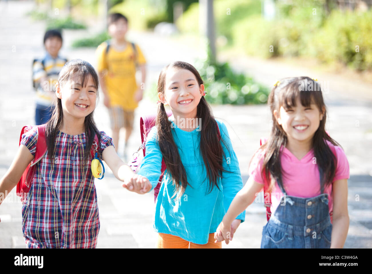 Girls Going to School Stock Photo - Alamy