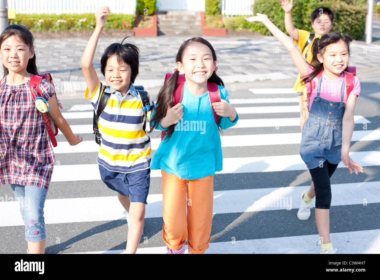 Kids crossing street, Japan Stock Photo - Alamy