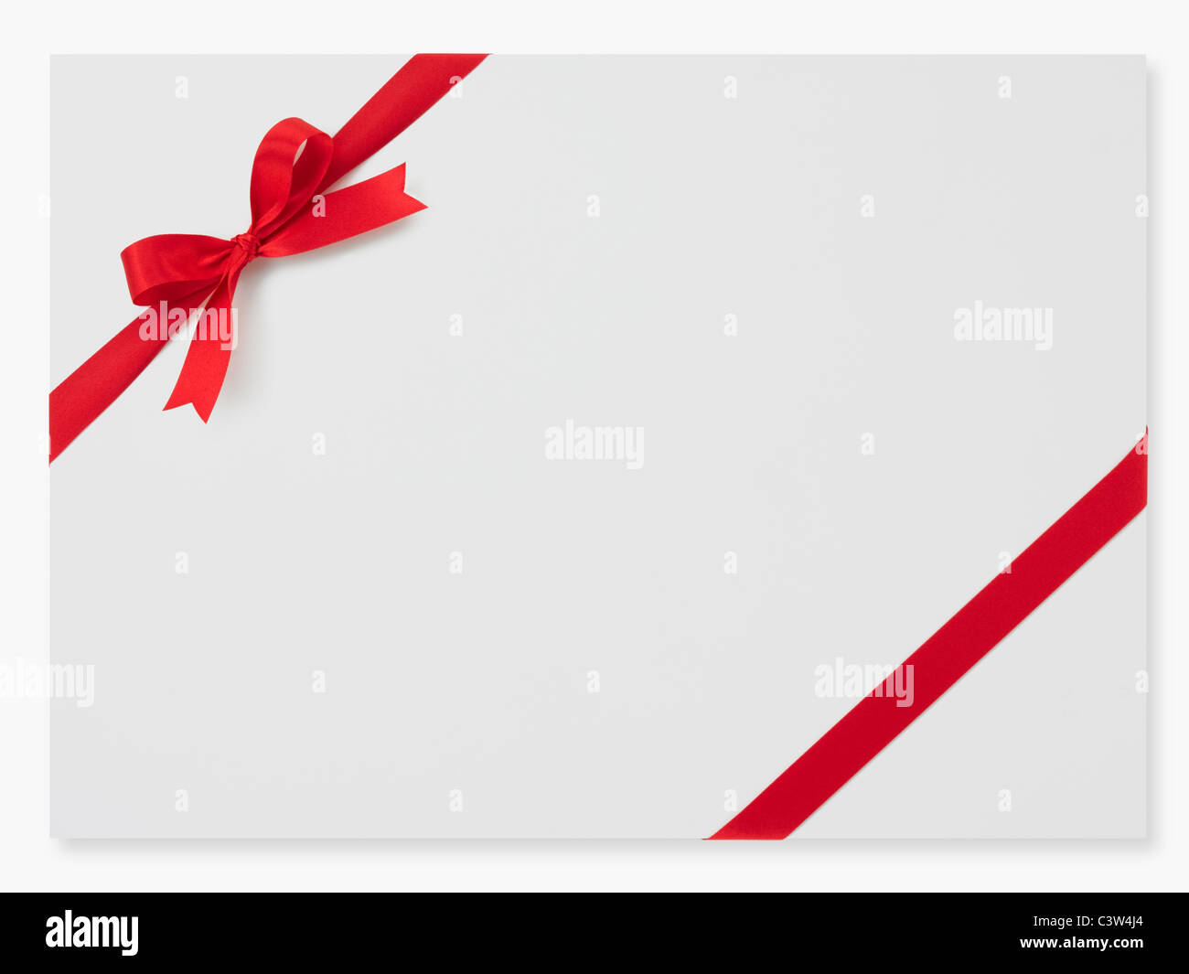 Red ribbon on a box Stock Photo - Alamy
