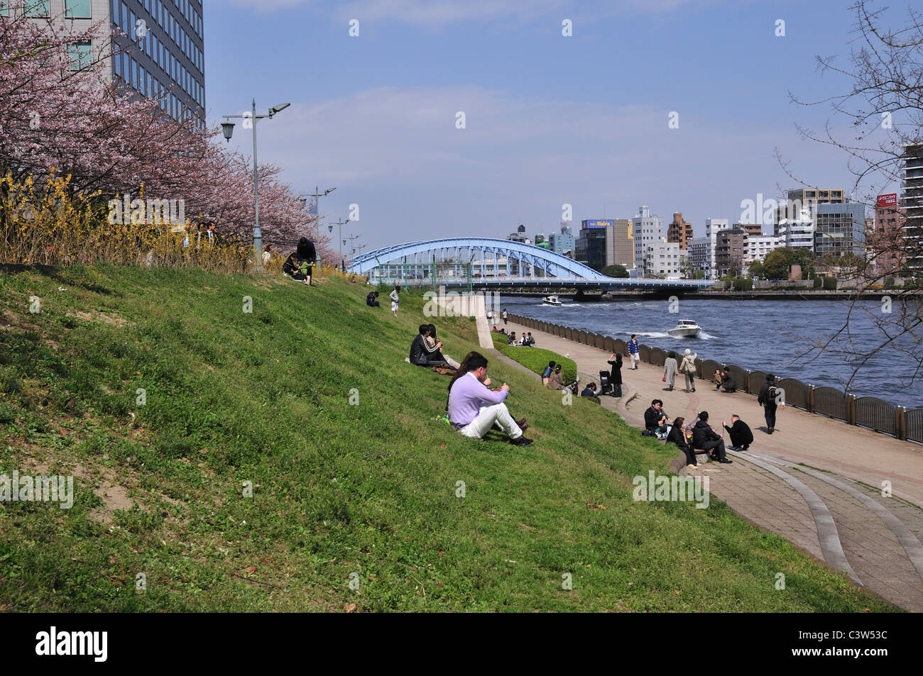 People at Sumida River, Eitai Bridge in Background Stock Photo - Alamy
