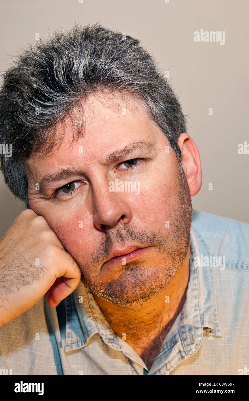 middle aged man feeling depressed sad lonely thinking poorly tired ...