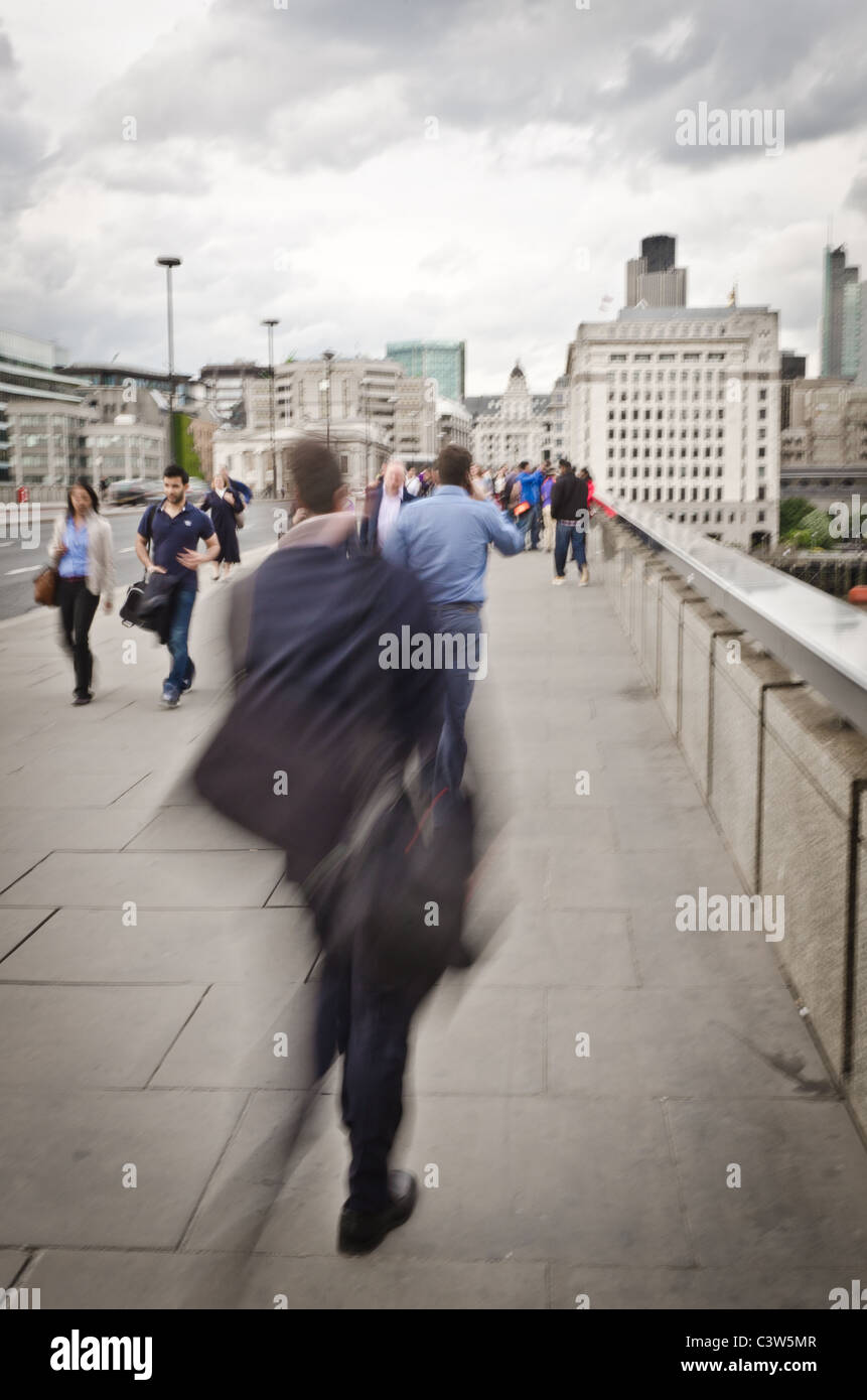 commuters walking over London Bridge Stock Photo - Alamy