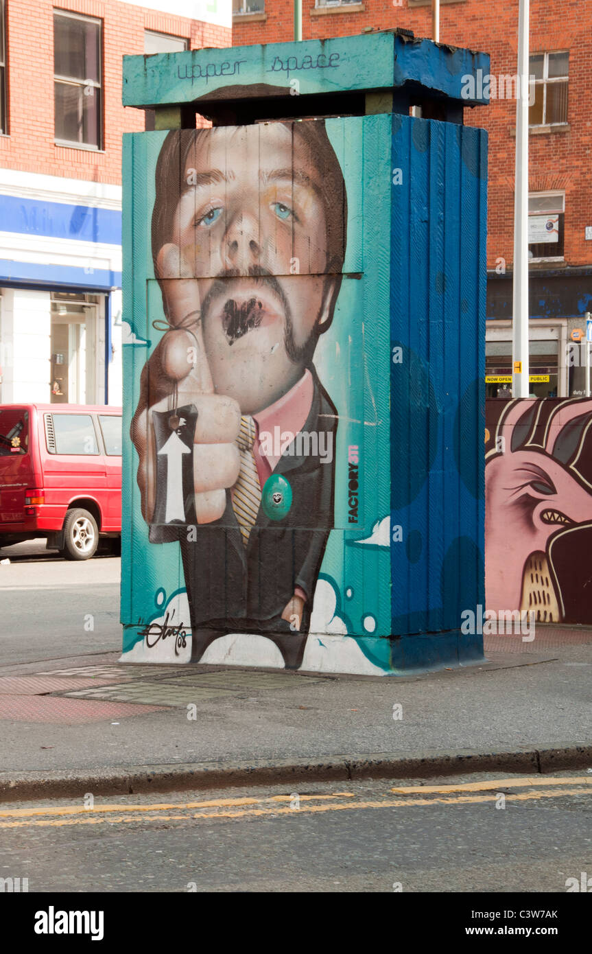 Mural on a concrete structure (possibly a ventilation shaft ...