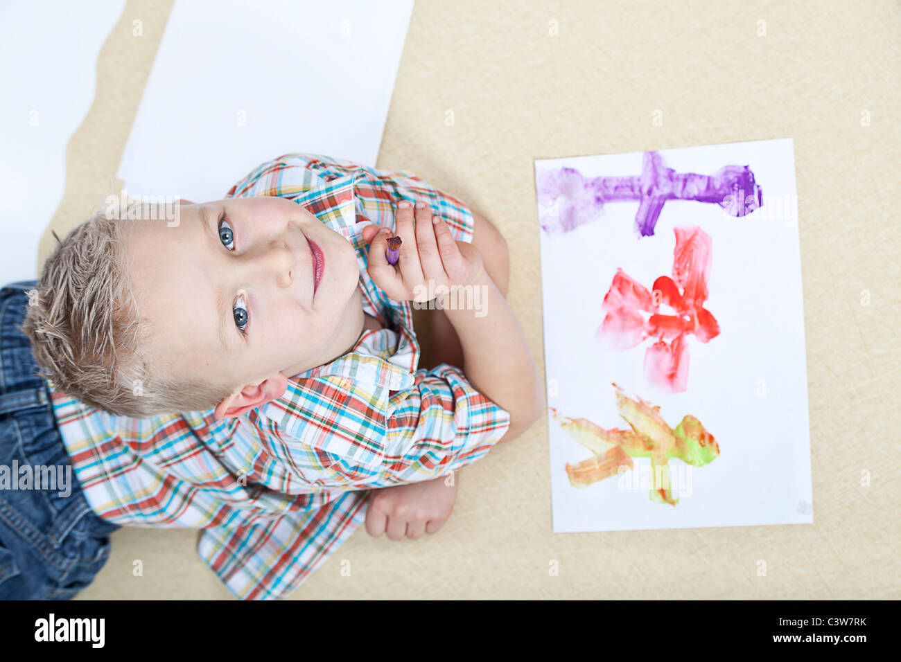 young boy with his beautiful colorful picture Stock Photo - Alamy