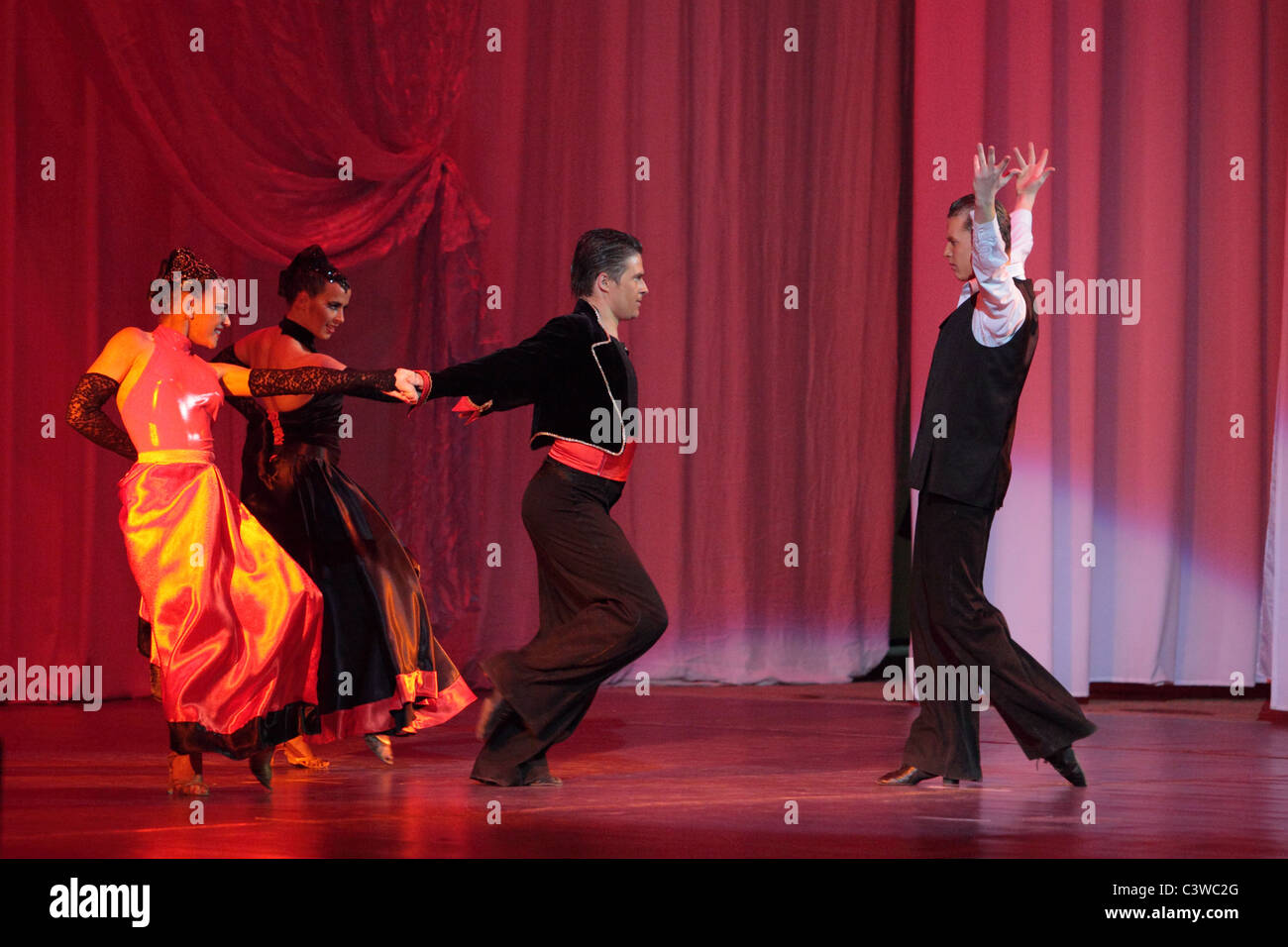 Two girls and two boys dancing flamenco Stock Photo - Alamy